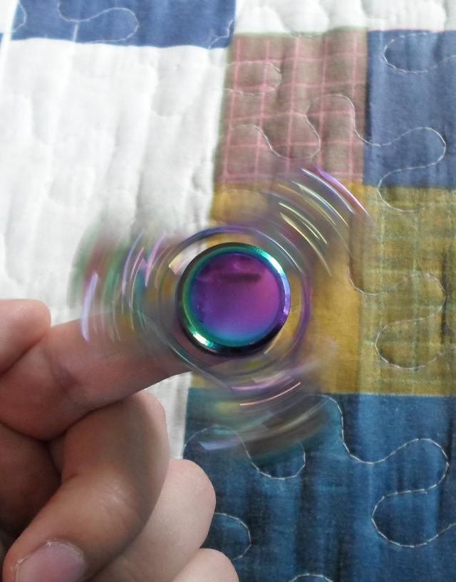 [26% OFF] 2021 Wheel Pattern Triangle Fidget Spinner In Multicolor ...